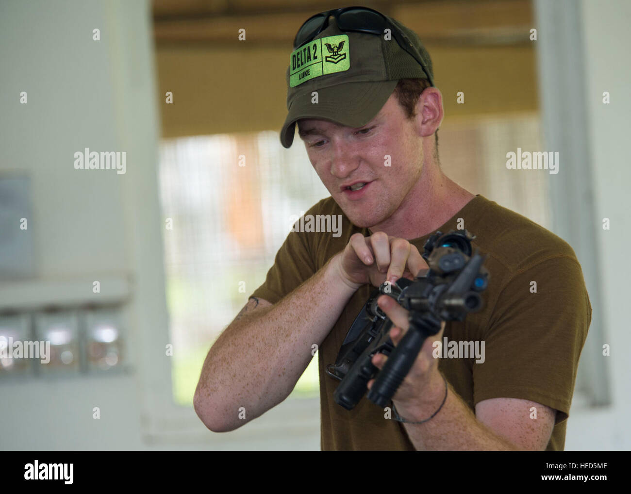 U.S. Navy Gunner's Mate 2nd Class Billy Luetkahans, attached to ...