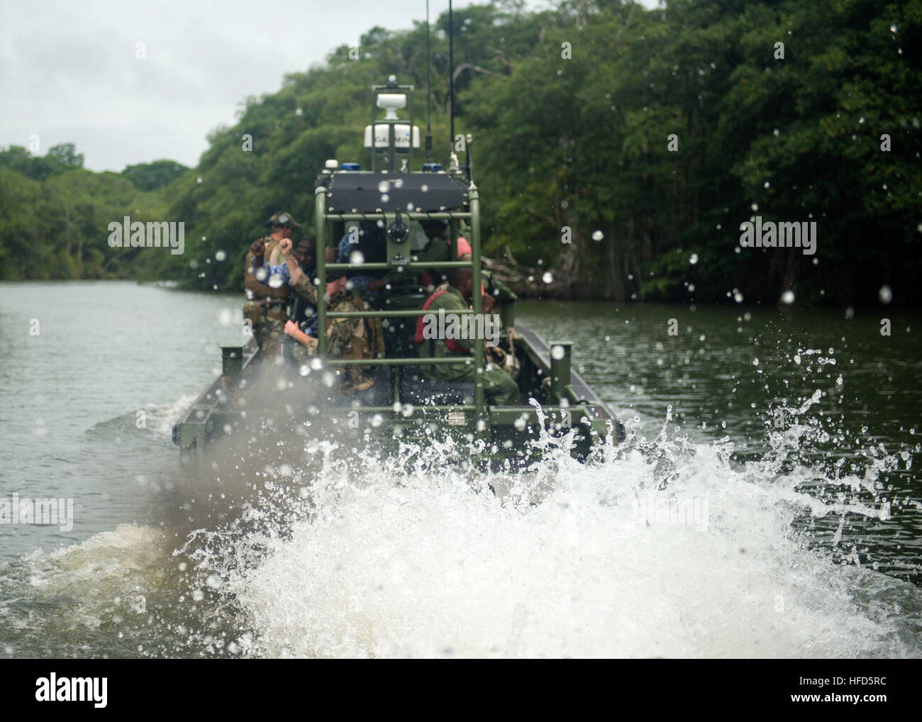 U.S. Navy service members, attached to Coastal Riverine Squadron ...