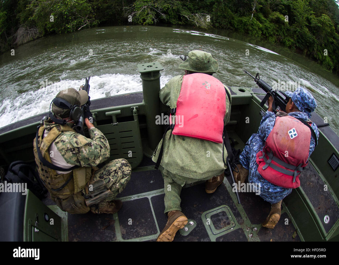 U.S. Navy service members, attached to Coastal Riverine Squadron ...