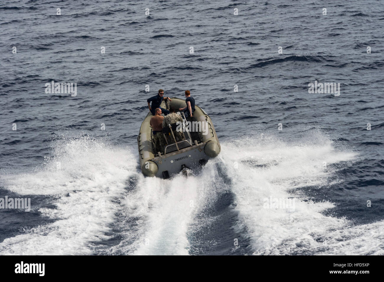 The small boat team conducts operations aboard the Military Sealift ...