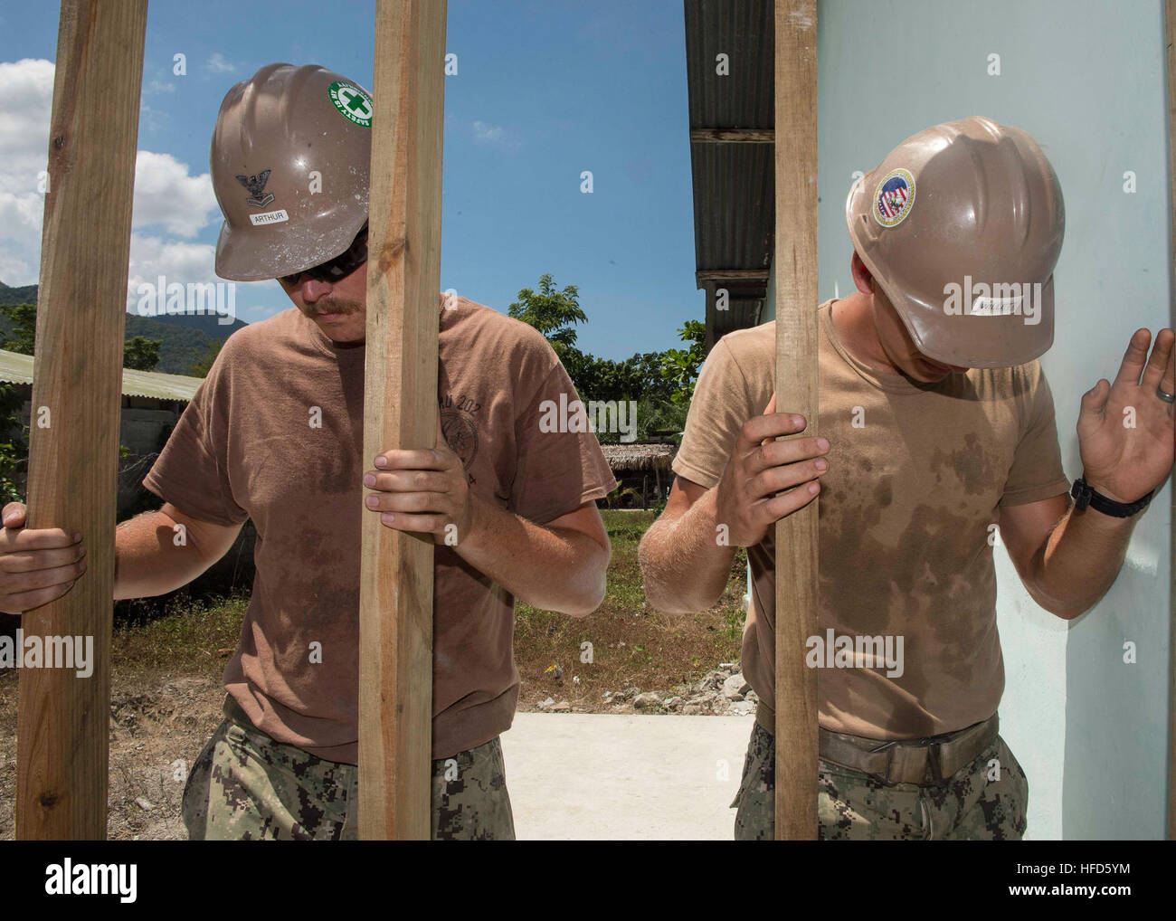 U.S. Navy Utilitiesman 2nd Class Robert Arthur and Engineering Aide ...
