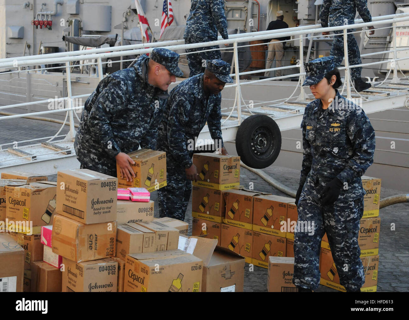 Sailors assigned to the guided-missile frigate USS Klakring prepare ...