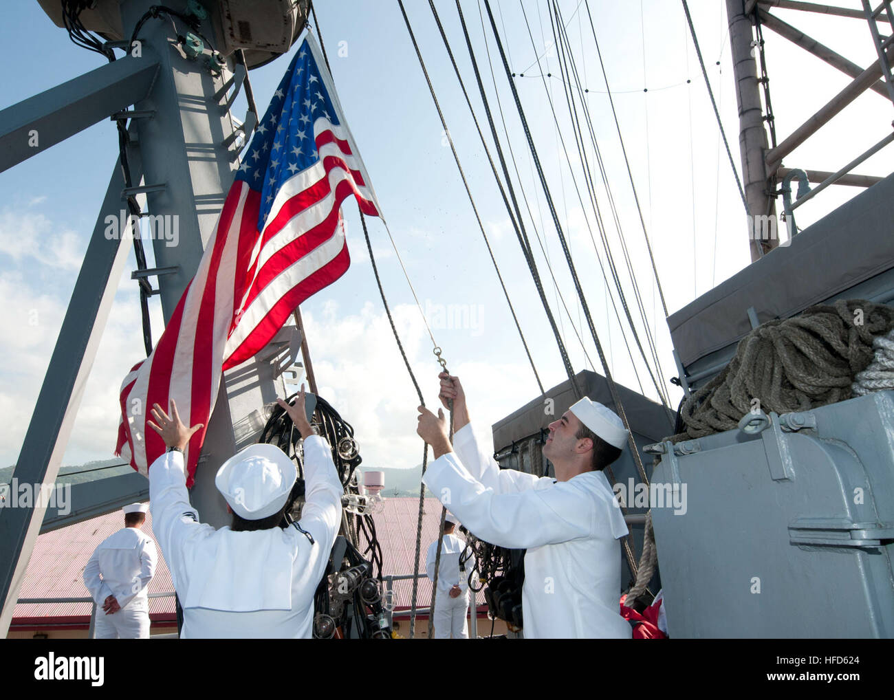 U.S. Navy Information Systems Technician 2nd Class Philip Coburn, left ...
