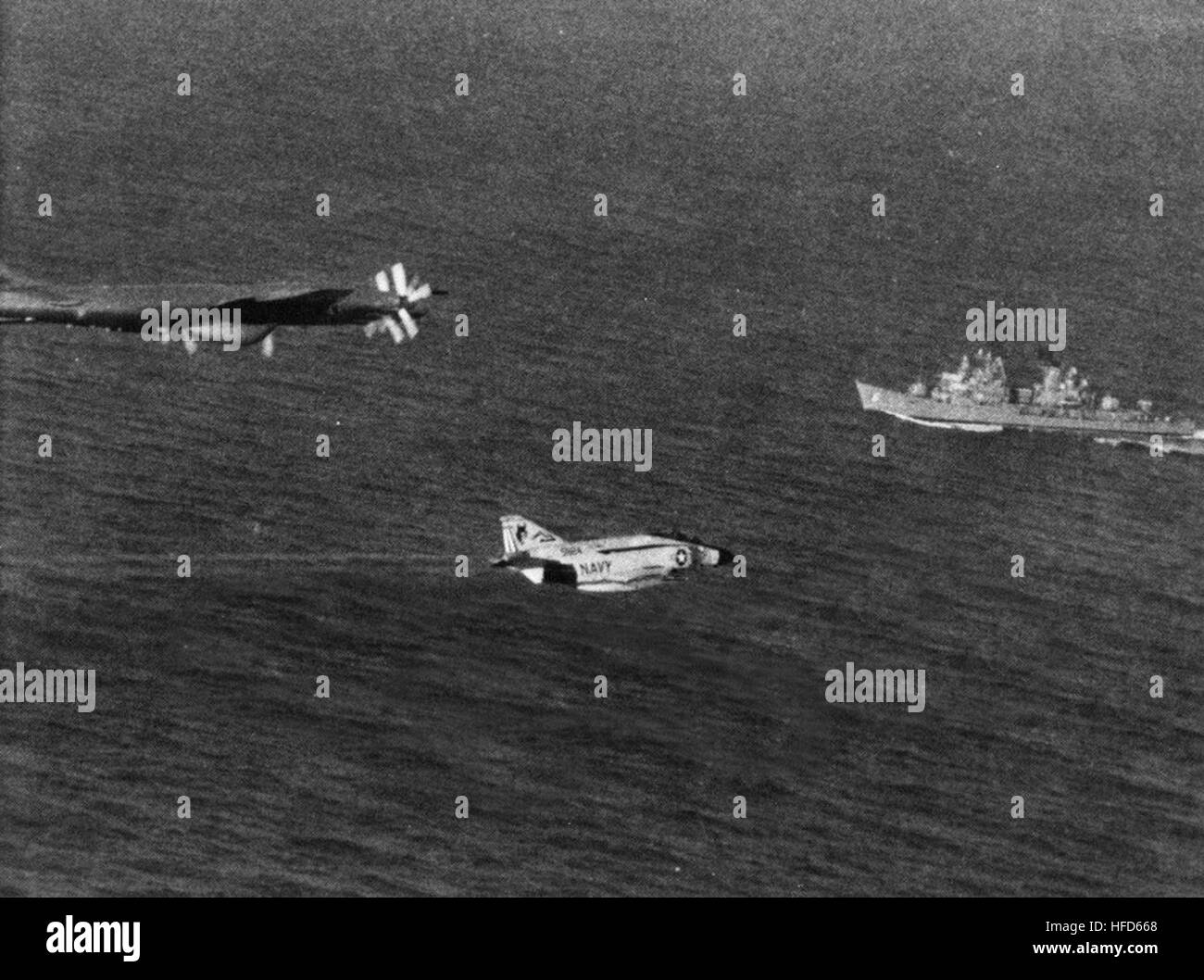 Soviet Tupolev Tu-95 flies over USS Barney (DDG-6) c1976 Stock Photo ...