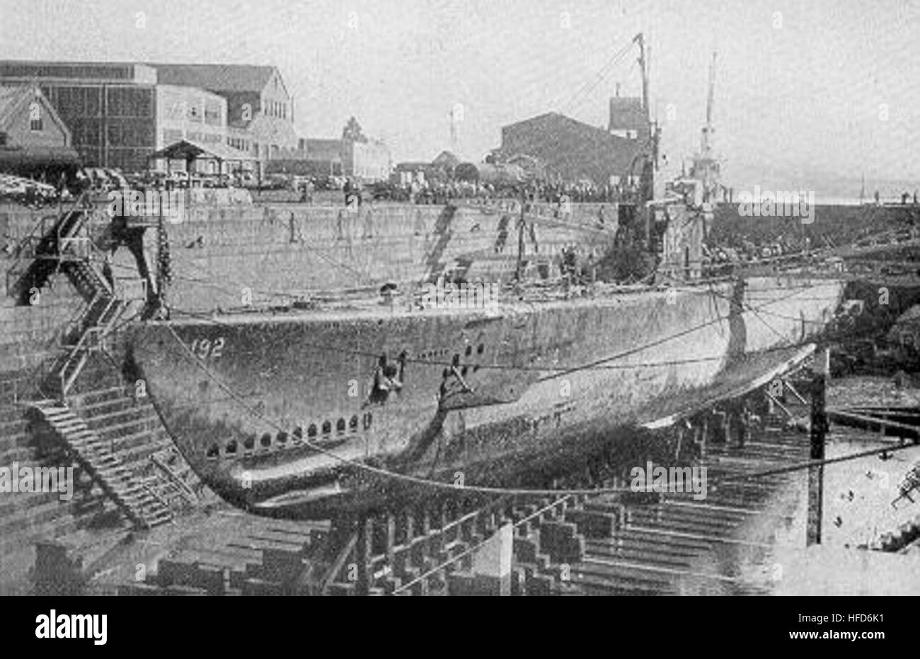 The submarine SS-192 is being salvaged following operational damage ...