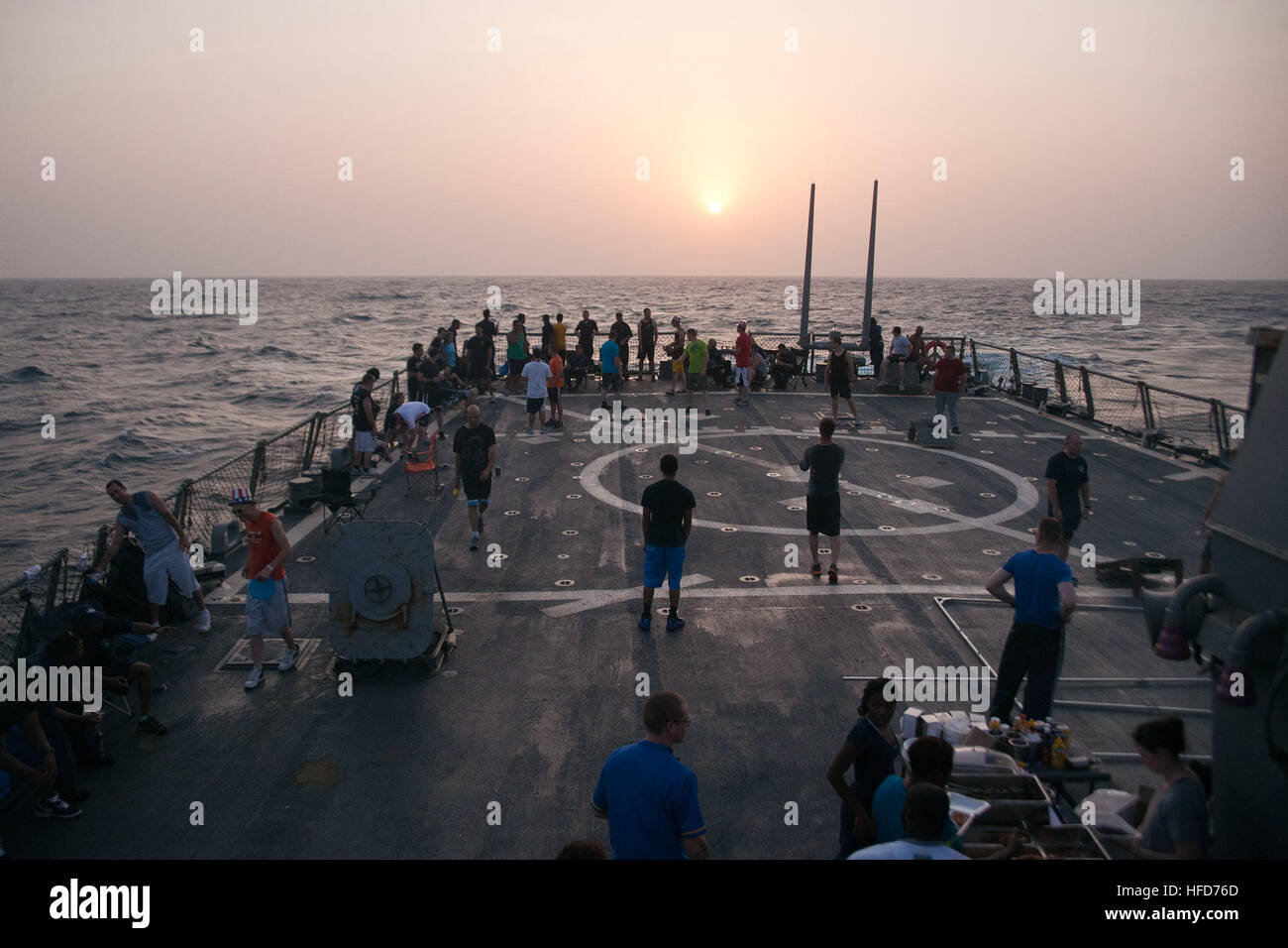 U.S. Sailors participate in a steel beach picnic aboard the guided ...