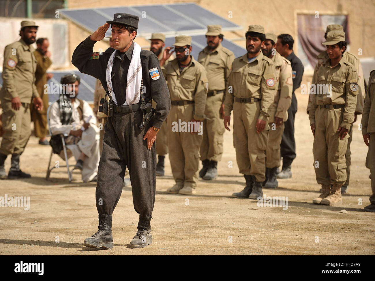 An Afghan National Police instructor leads Afghan Local Police recruits ...