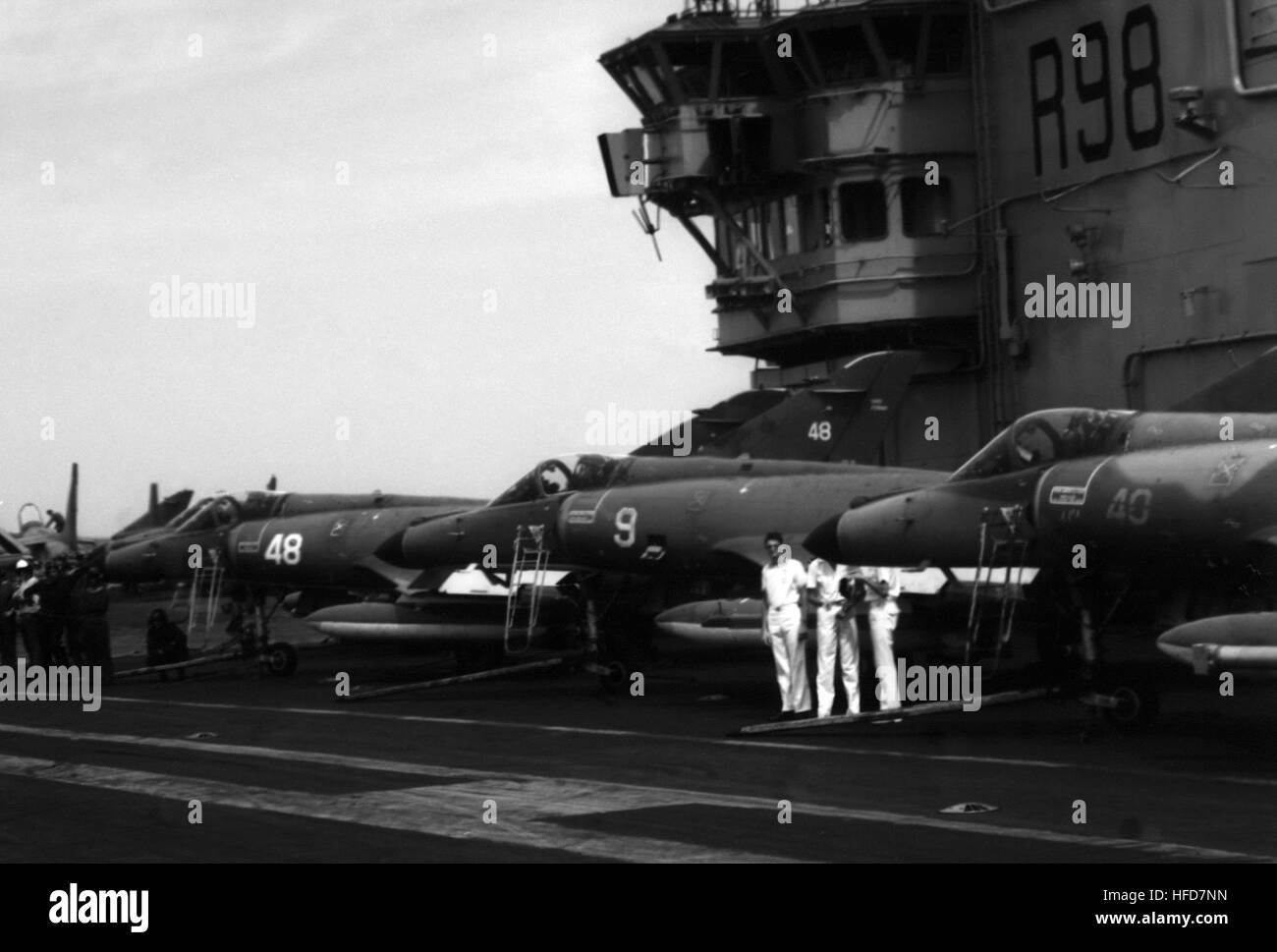 French Sailors stand in front of Super Entendard aircraft parked on the ...