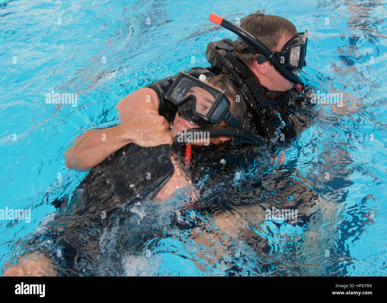 Petty Officer 2nd Class John Dahlgren, a search and rescue swimmer ...