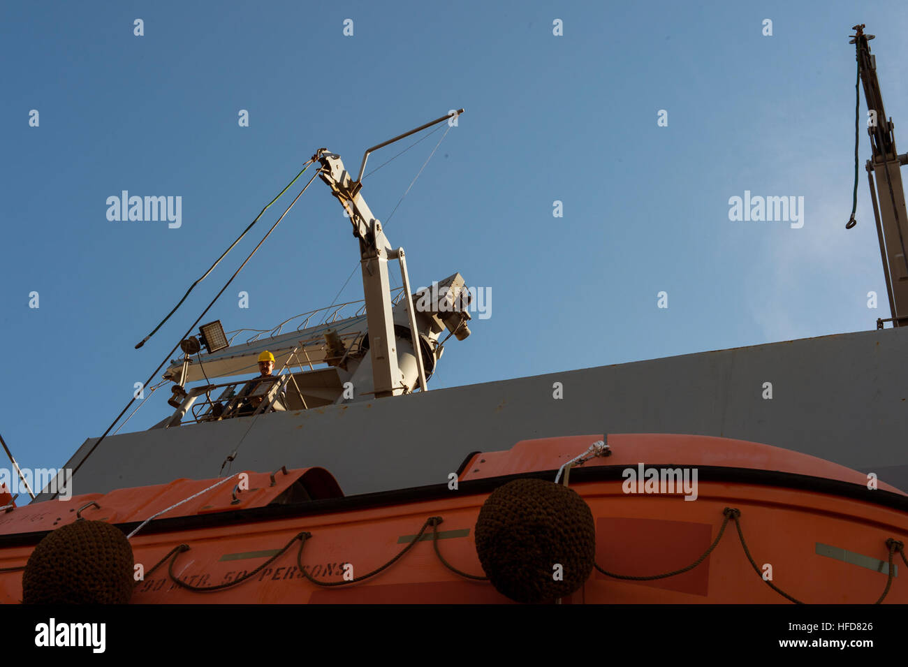 Crew members aboard the roll-on/roll-off and container ship MV Cape Ray ...