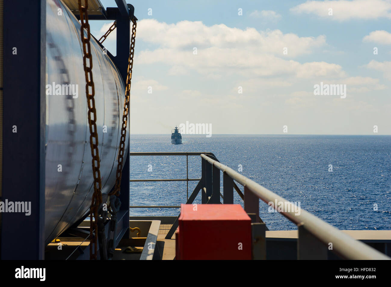 A vessel assigned to an international task force travels with the ...