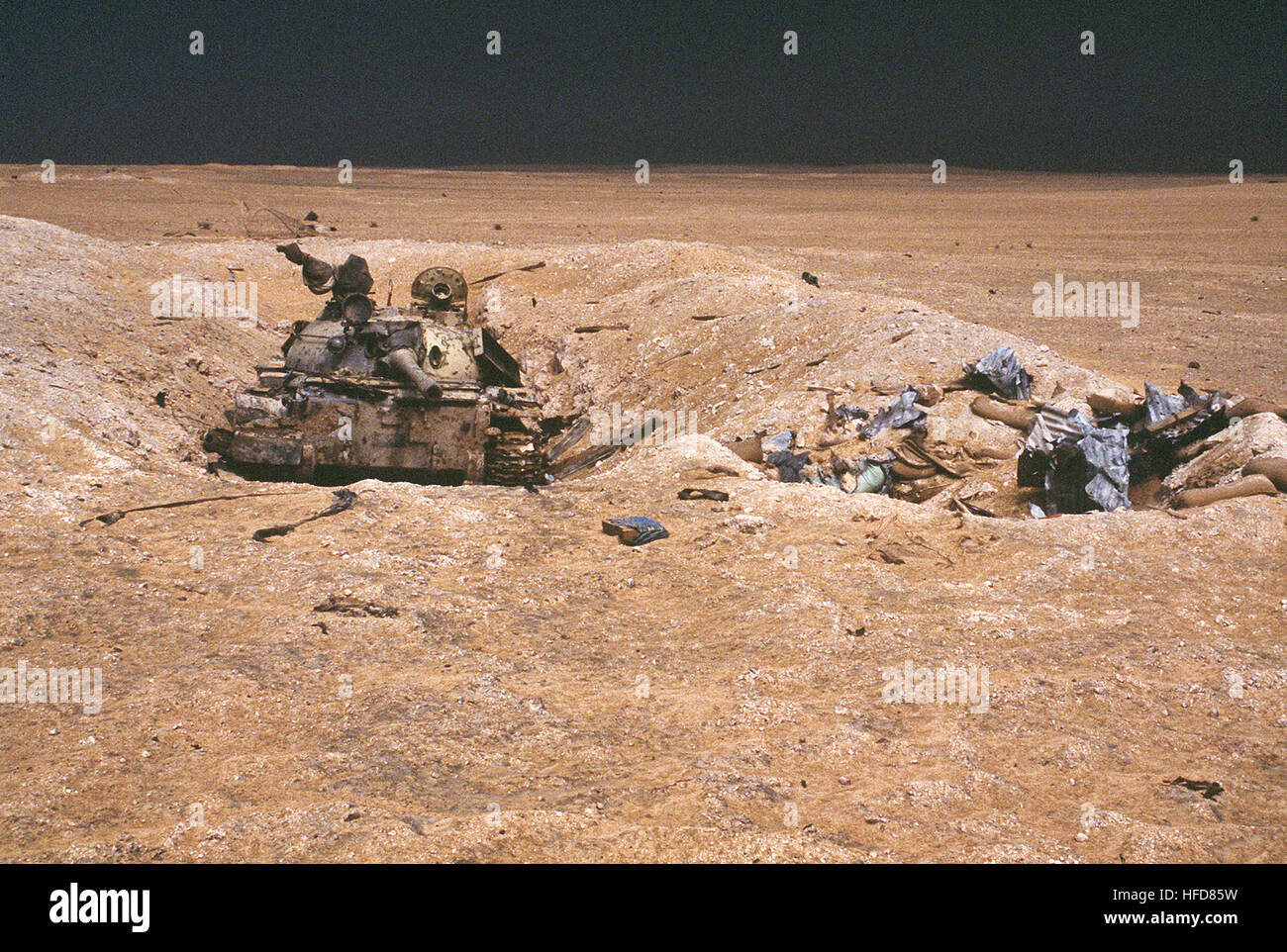 The charred remains of an Iraqi T-55 main battle tank lies abandoned ...