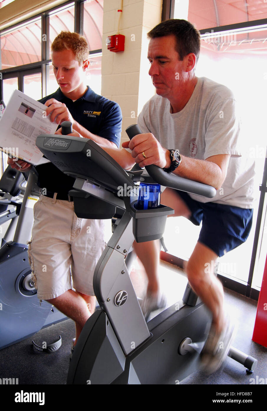 Cmdr. Robert Chase performs a cardiovascular workout under the ...