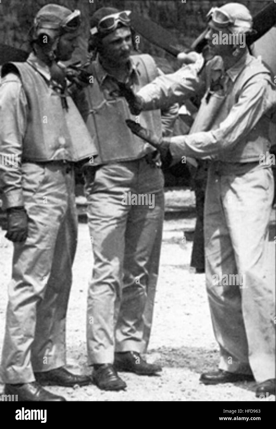 U.S. Navy aviator John Thach instructs new pilots on aerial combat ...