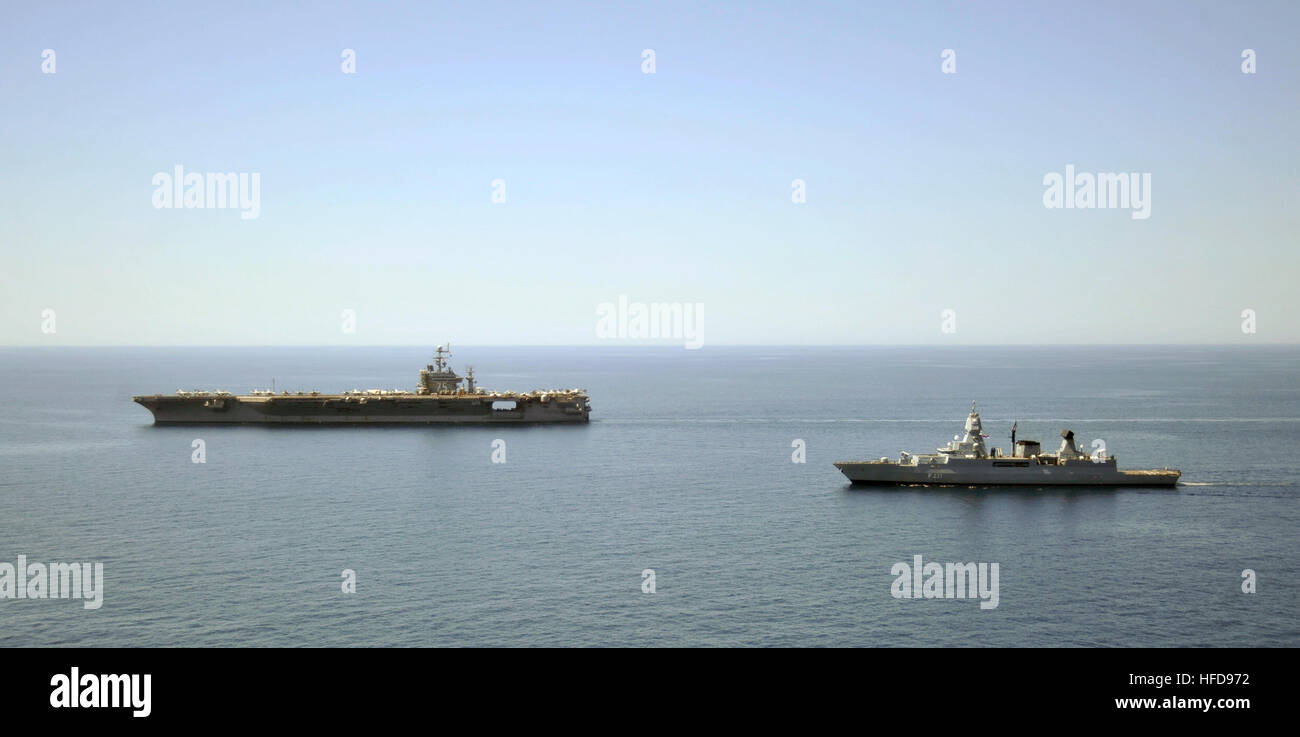 The German navy air defense frigate FGS Hessen (F221), right, cruises ...