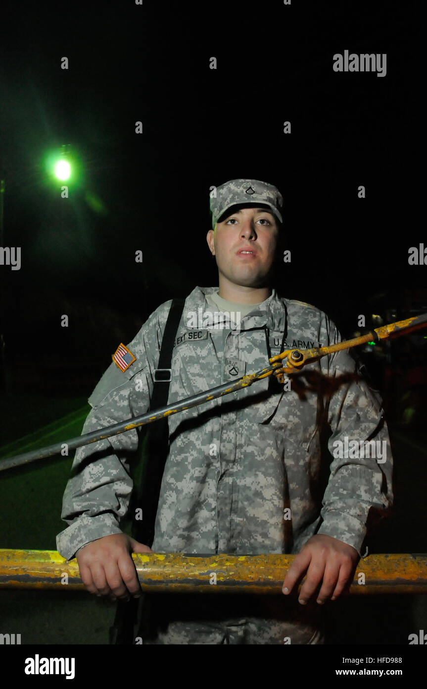 A Rhode Island Army National Guard Pfc. provides external security at ...