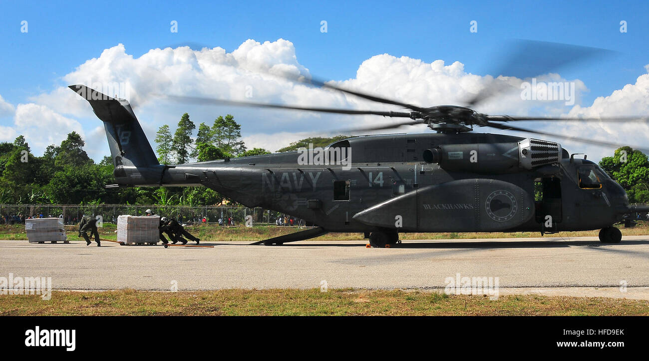 The crew of a U.S. Navy MH-53E Sea Dragon helicopter assigned to ...