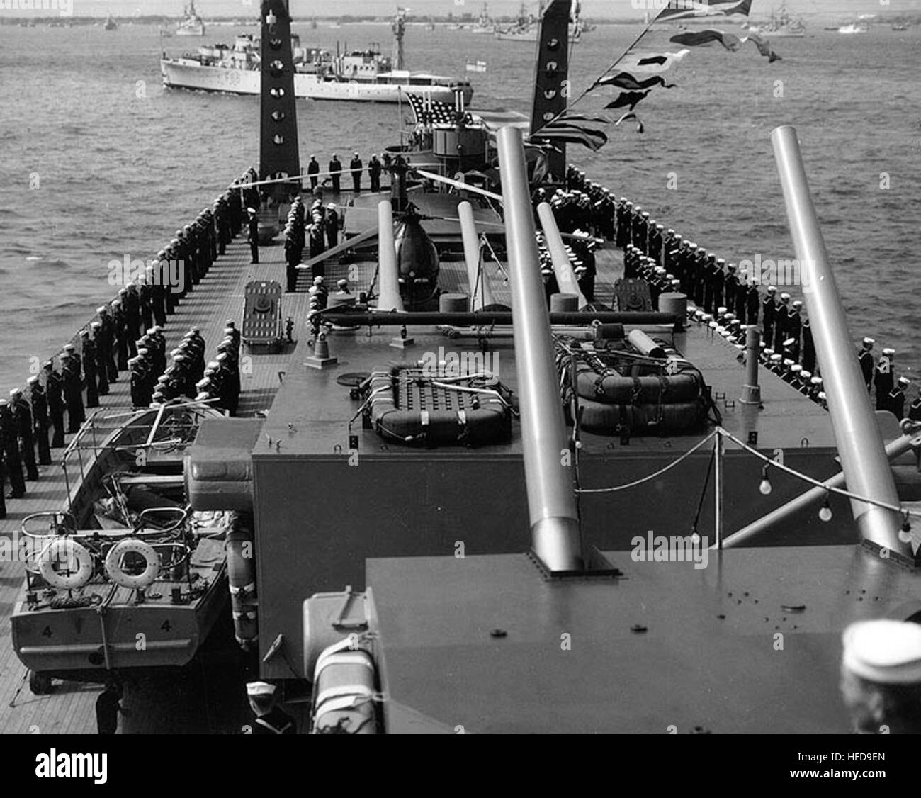 The crew of the U.S. Navy heavy cruiser USS Baltimore (CA-68) manning ...