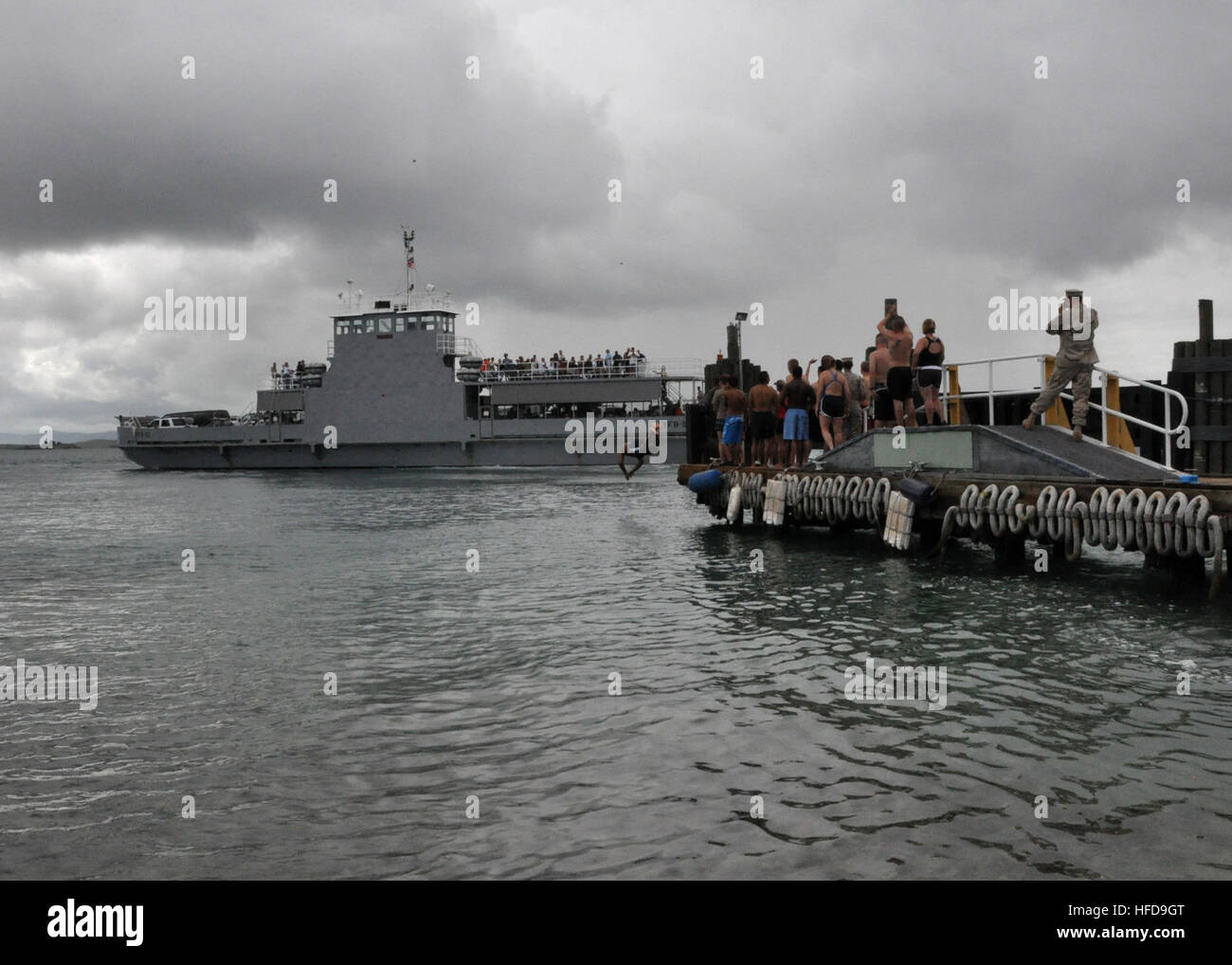 Sailors, Marines and civilians assigned to the Naval Station Guantanamo ...