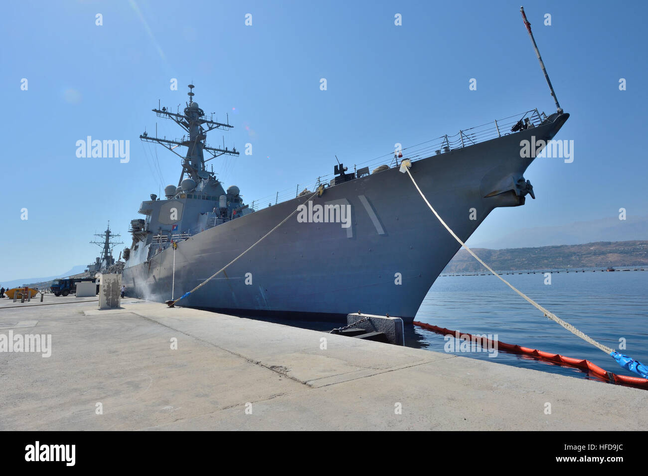 The guided missile destroyer USS Ross (DDG 71) is moored pierside ...