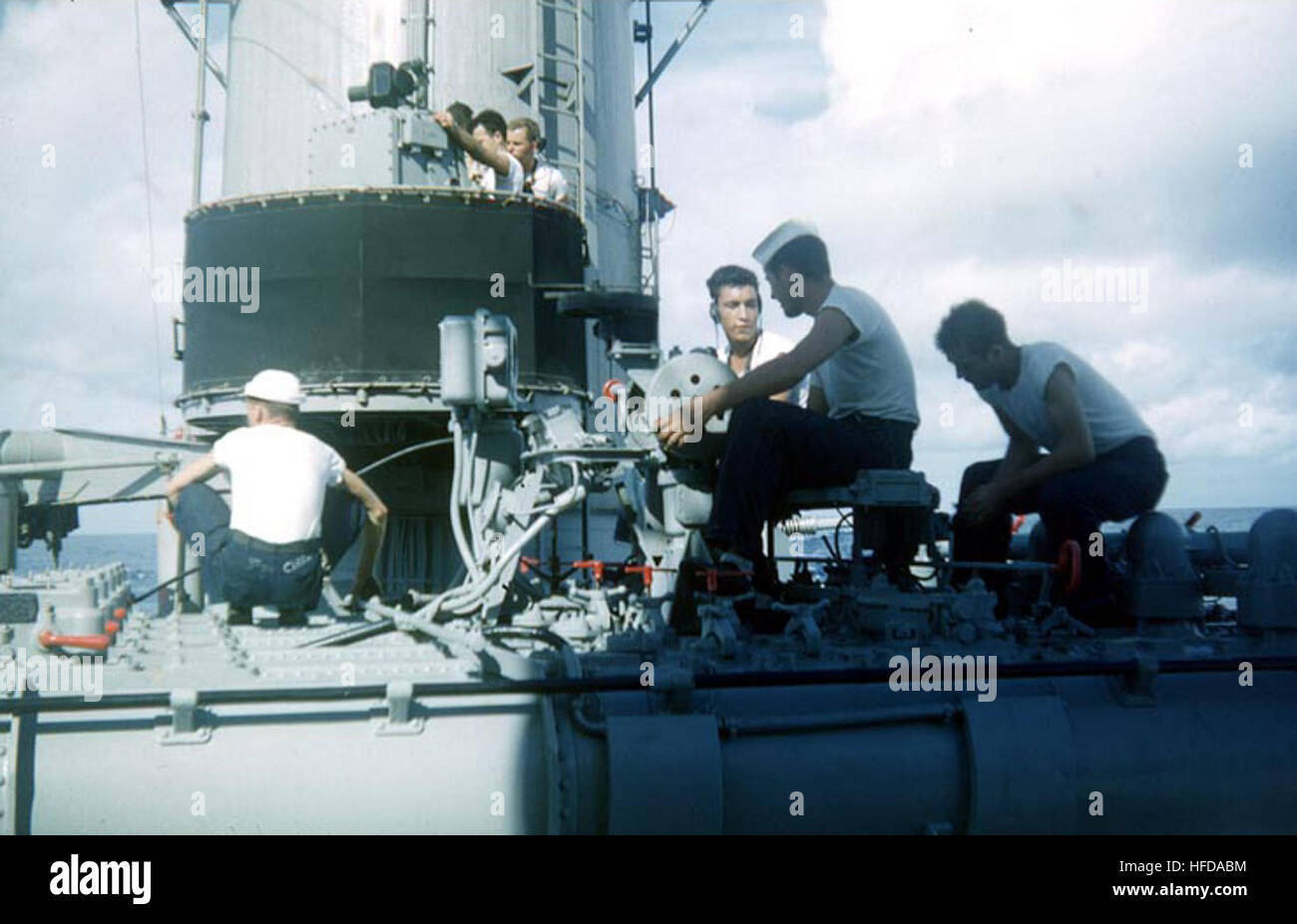 USS O'Brien (DD-725) crew members at their stations on the ship's ...