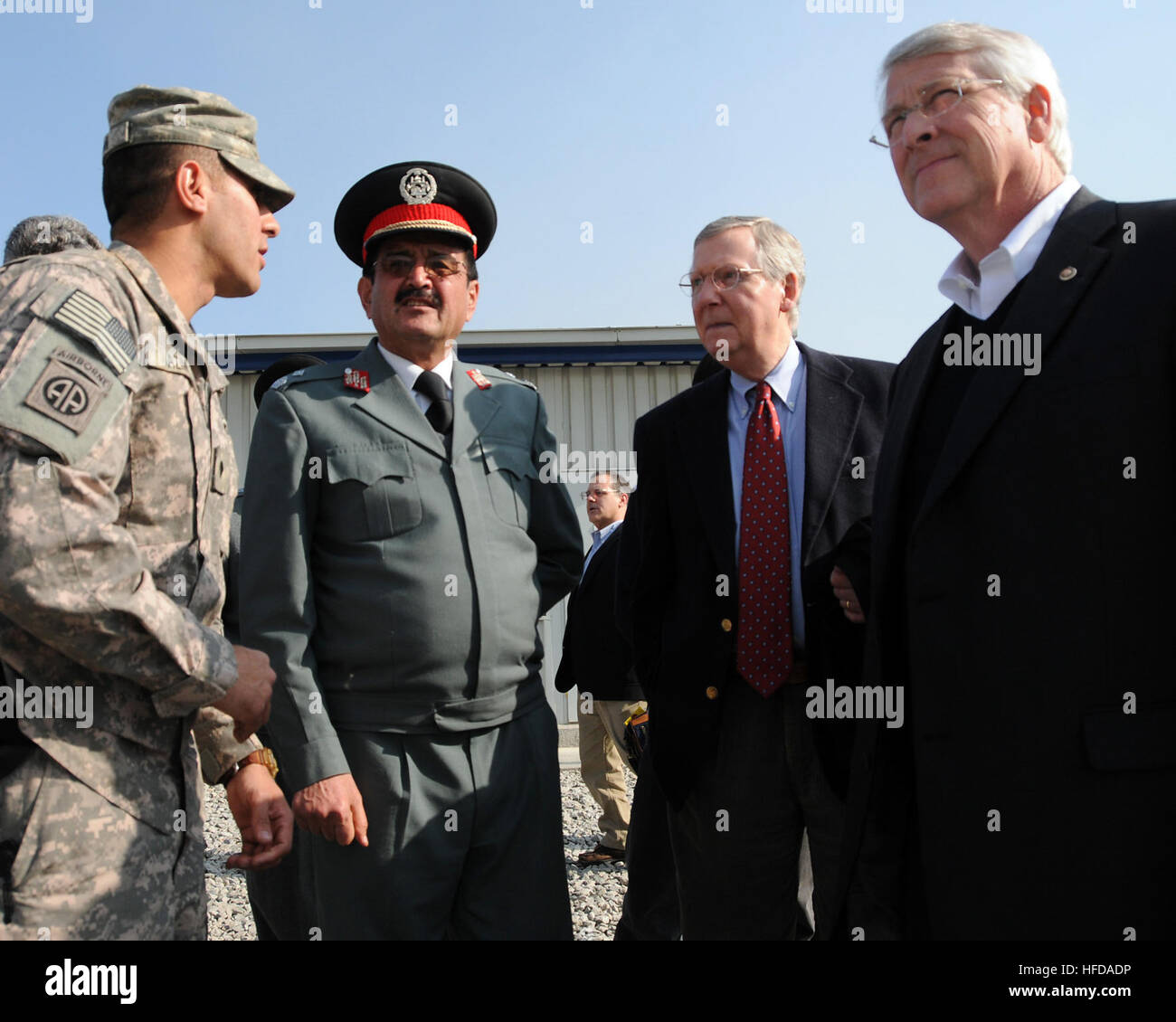 U.S. Army Spc. Mohamad Azimi, left, translates for Afghan Brig. Gen ...