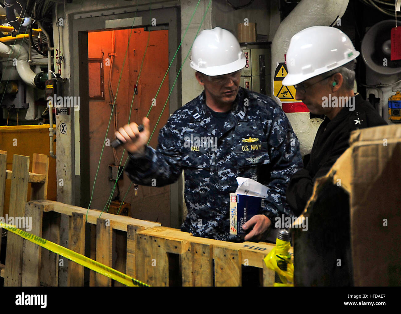 Main propulsion assistant, Lt. Anthony Hall briefs Commander ...