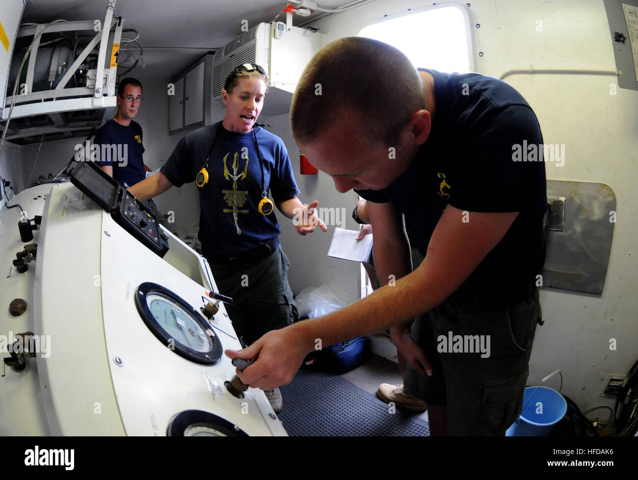 Navy divers from Mobile Diving and Salvage Unit 2 operate a ...