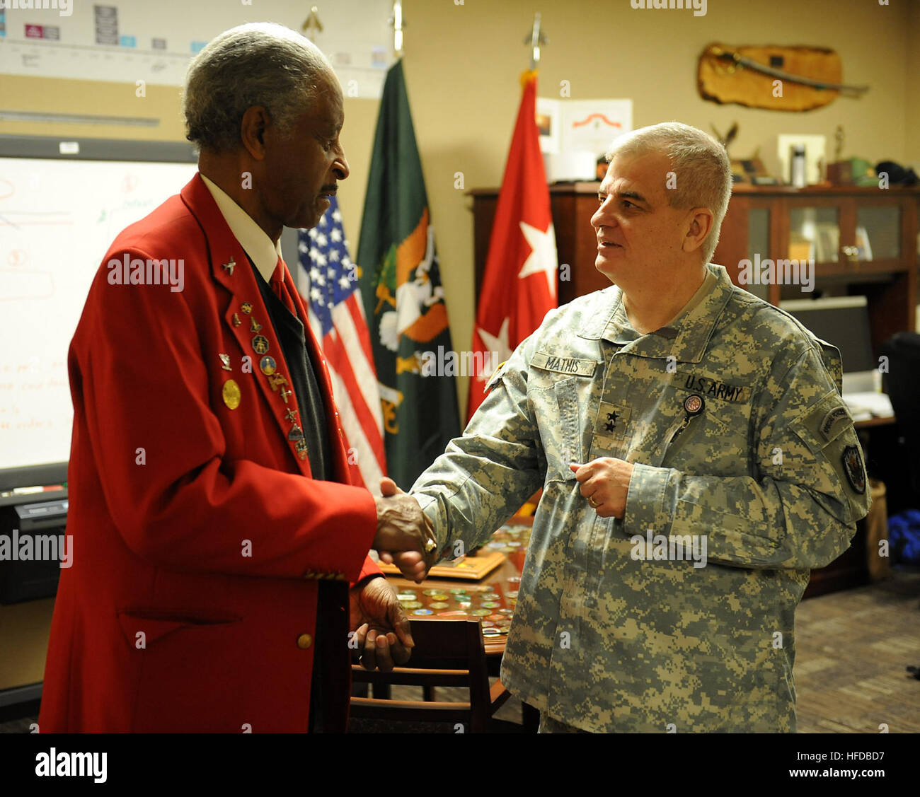 U.S. Army Maj. Gen. Jeff W. Mathis III, commander, Joint Task Force Civil Support, greets Ezra ...
