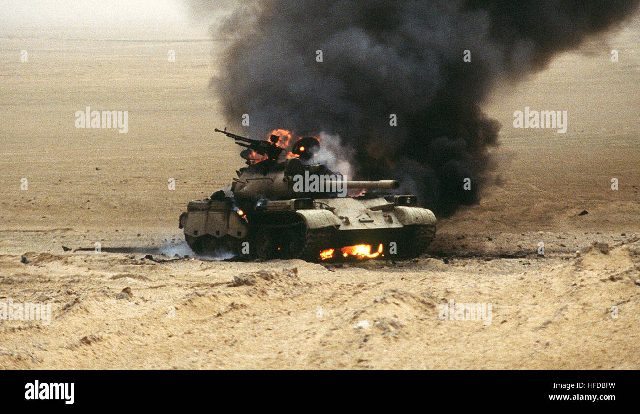 An Iraqi T-55 main battle tank burns after an attack by the 1st United ...