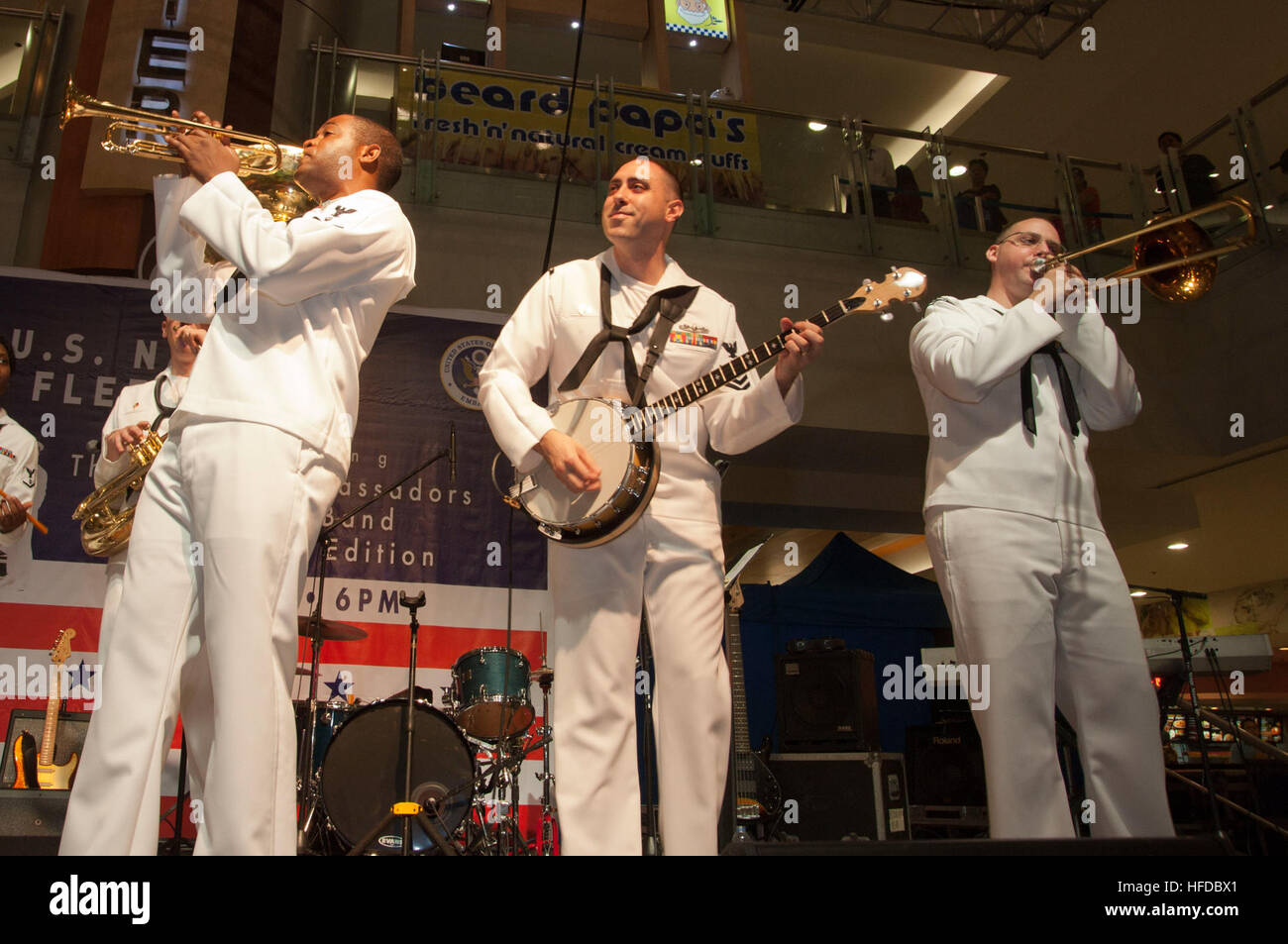 The U.S. 7th Fleet Band, Far East Edition Brass Band, performs for more ...