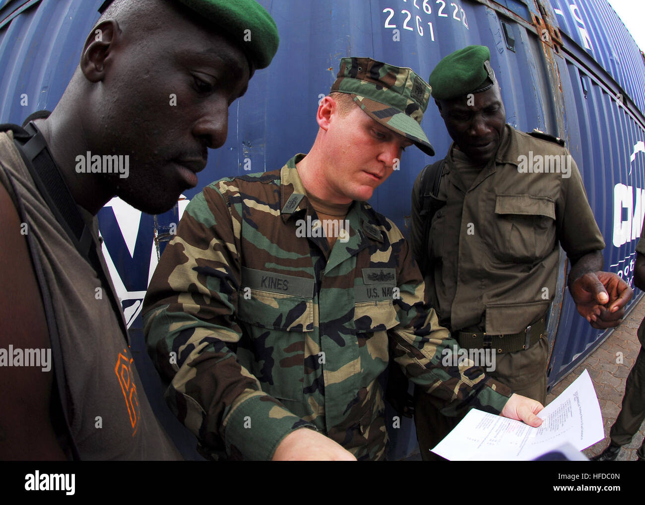 Chief John Kines, chief gunner's mate, checks aboard new Africa ...