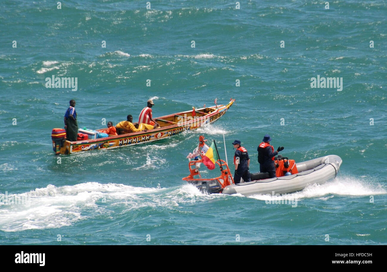 Petty Officer 3rd Class Shawn Cooper, a Coast Guard maritime ...