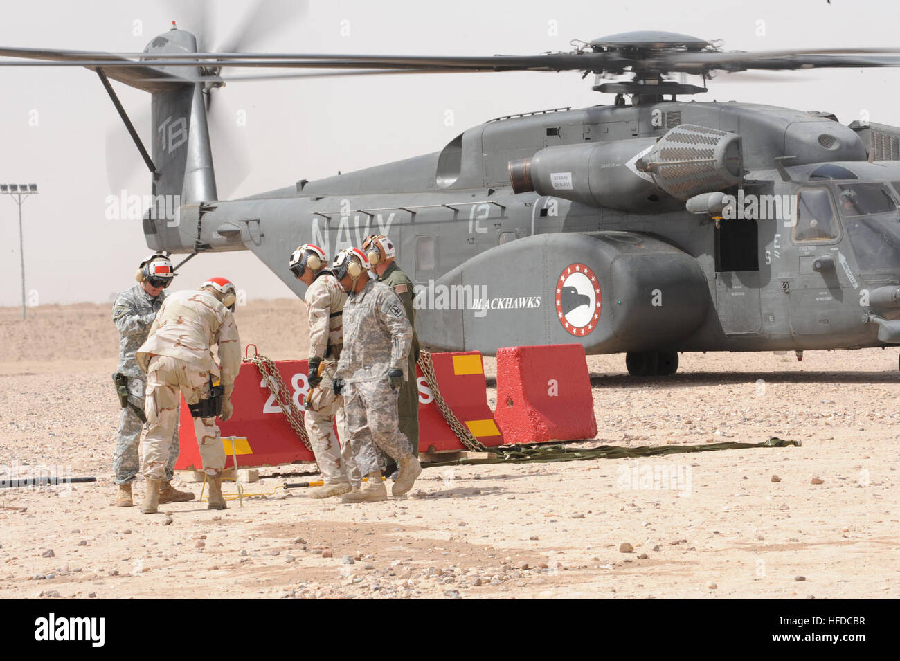 Members of the United States Navy, Army and Coast Guard conduct sling ...