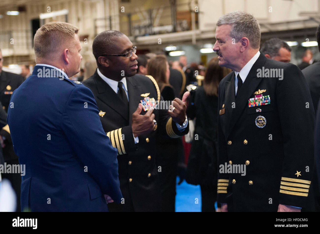 U.S. Navy Capt. Robert A. Hall Jr., right, the commanding officer of ...