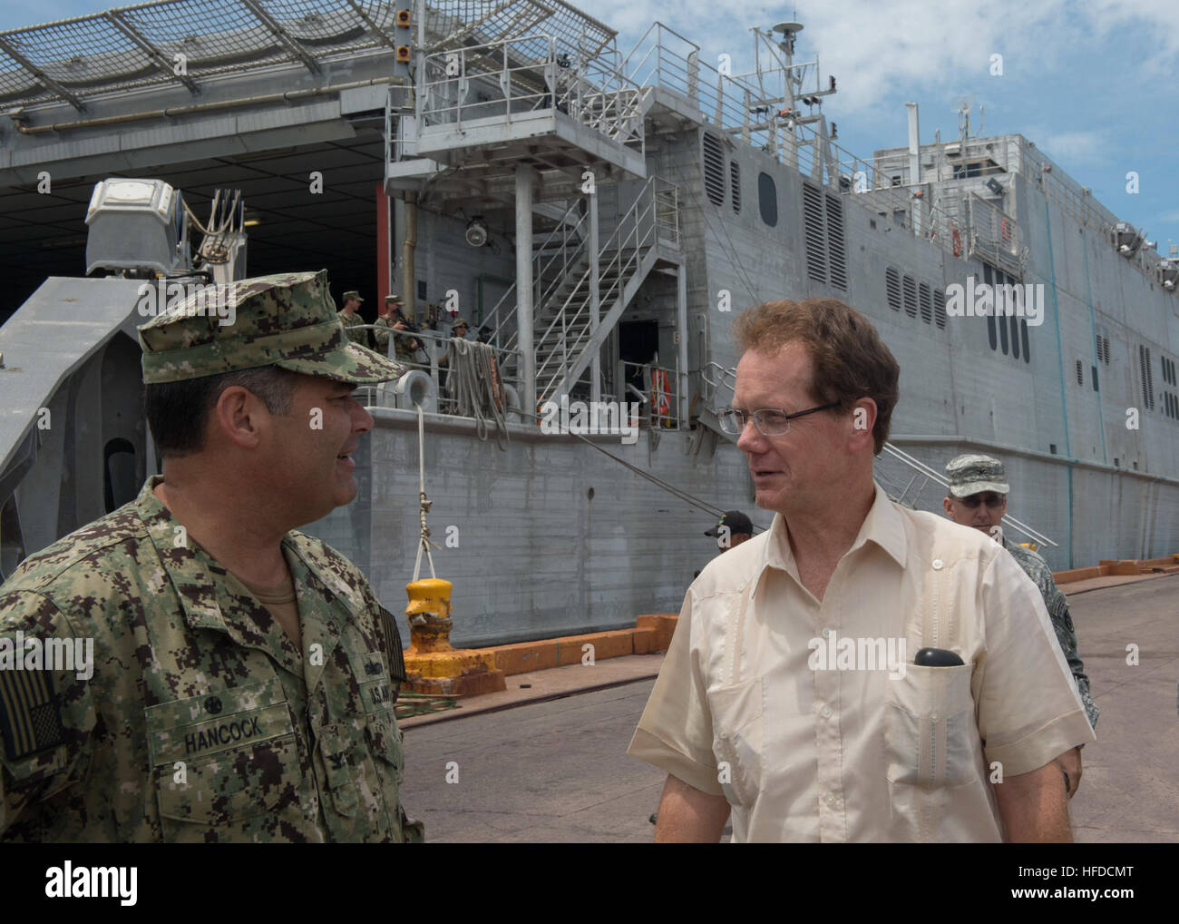 U.S. Navy Capt. Sam Hancock, left, the mission commander for Southern ...