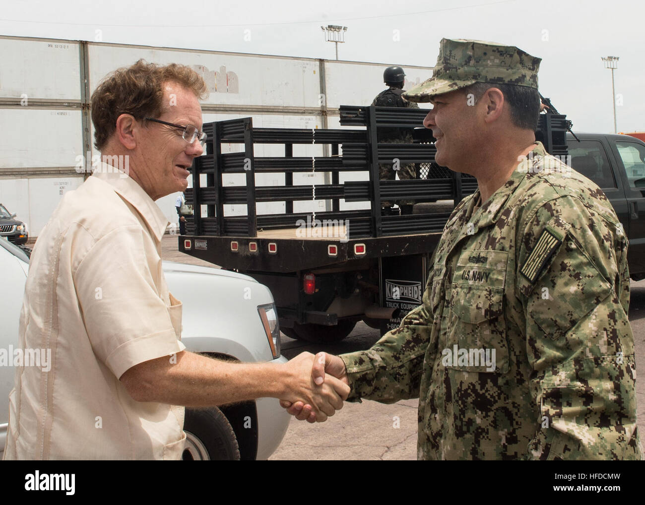U.S. Navy Capt. Sam Hancock, right, the mission commander for Southern ...