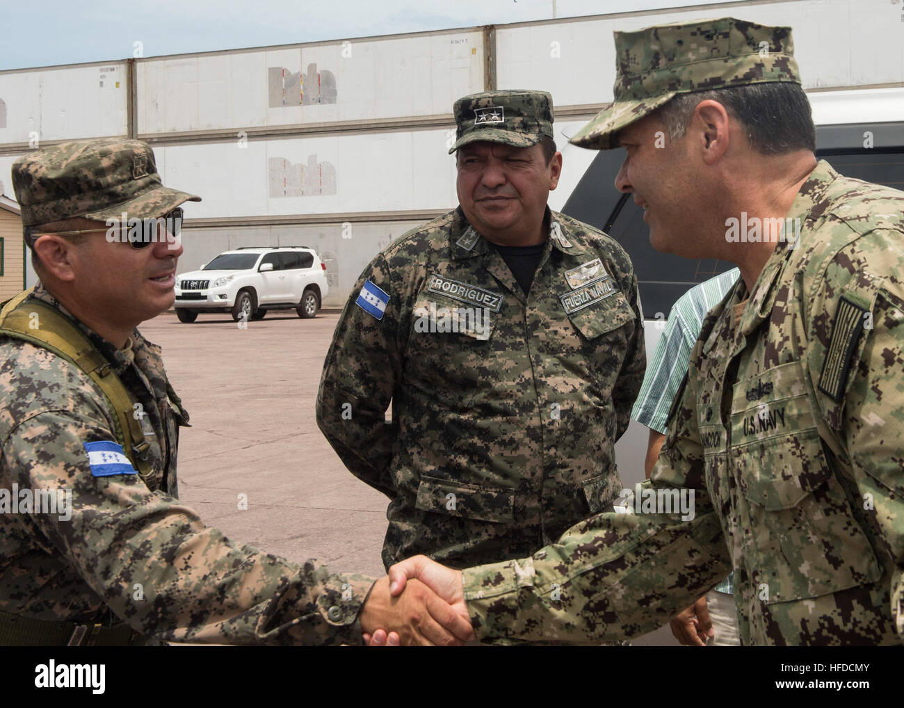 U.S. Navy Capt. Sam Hancock, right, the mission commander for Southern ...