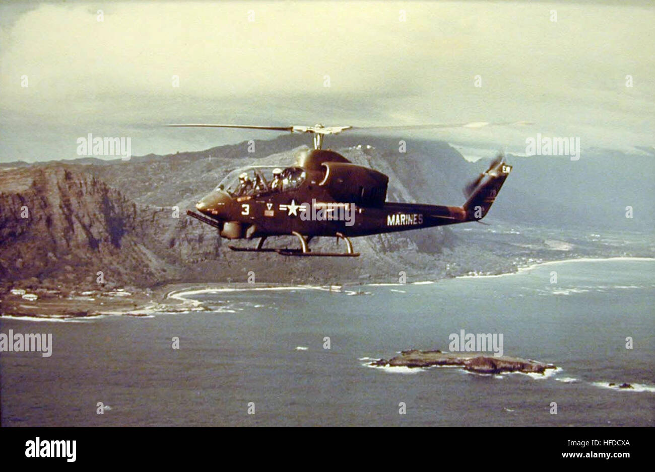 AH-1J SeaCobra flying off Hawaii c1971 Stock Photo - Alamy