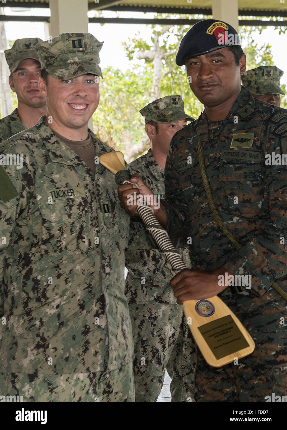 U.S. Navy Lt. Sean Tucker, left foreground, attached to Coastal ...