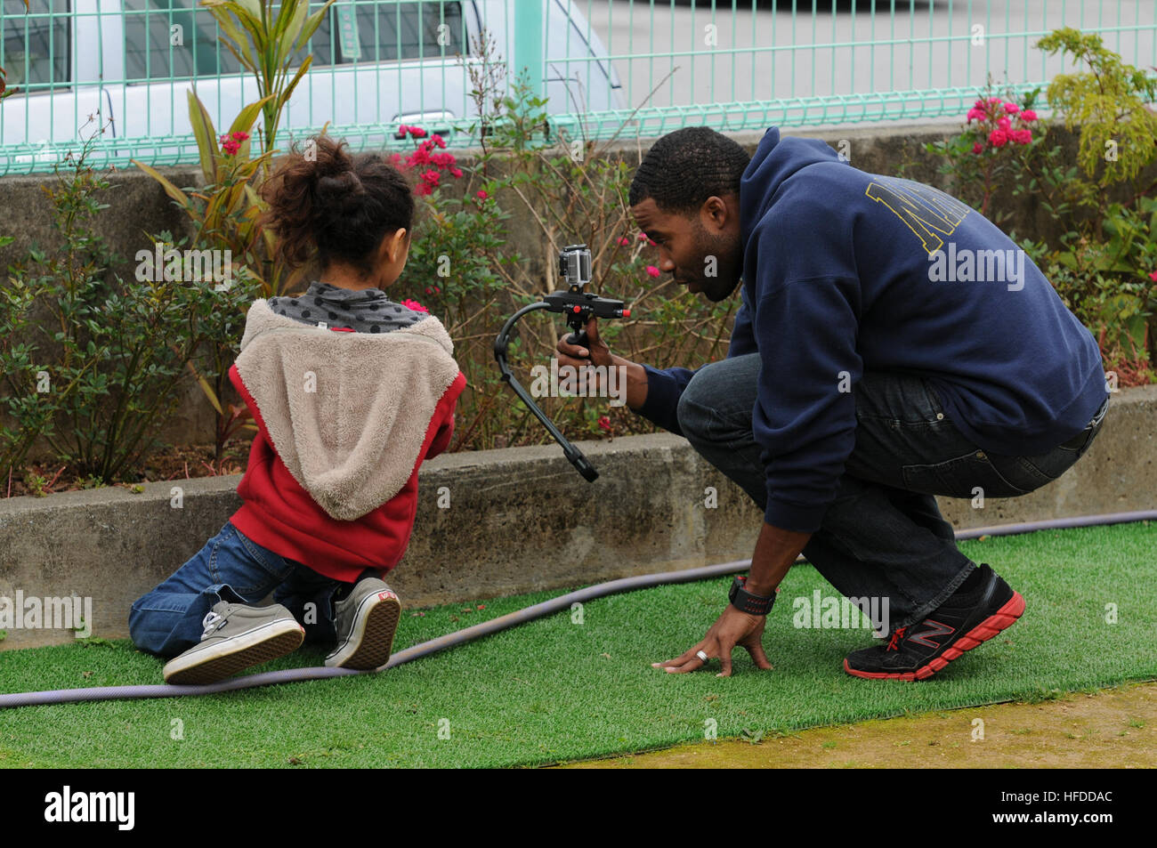 U.S. Navy Personnel Specialist 1st Class Kenneth Gates, right, assigned ...