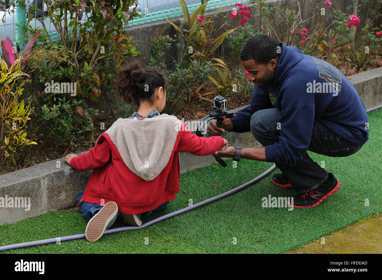 U.S. Navy Personnel Specialist 1st Class Kenneth Gates, right, assigned ...