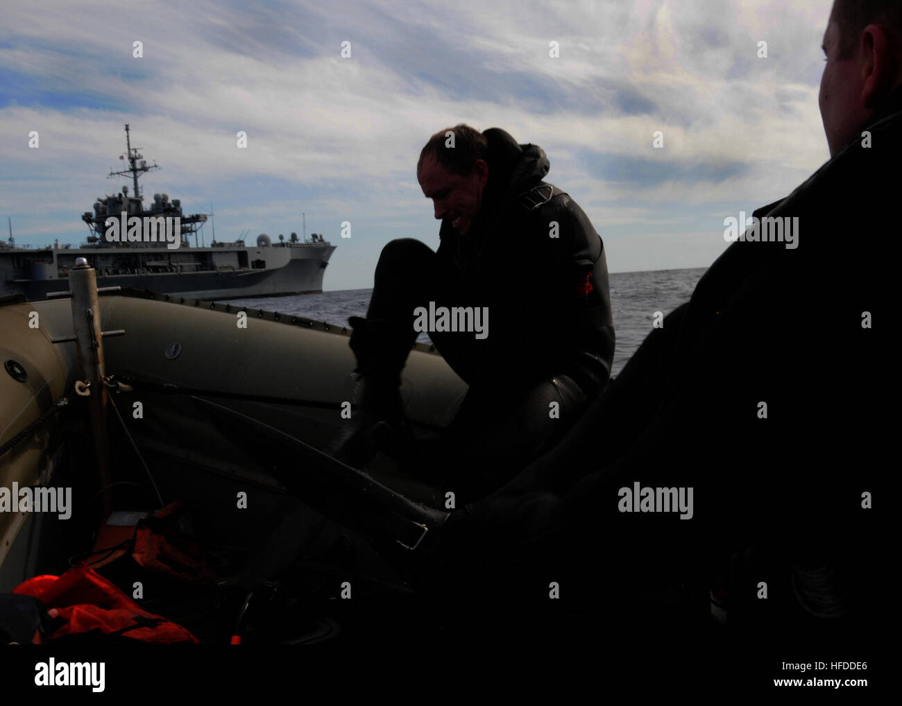 U.S. Navy search and rescue swimmers 3rd Officer Matthew Hadler and ...