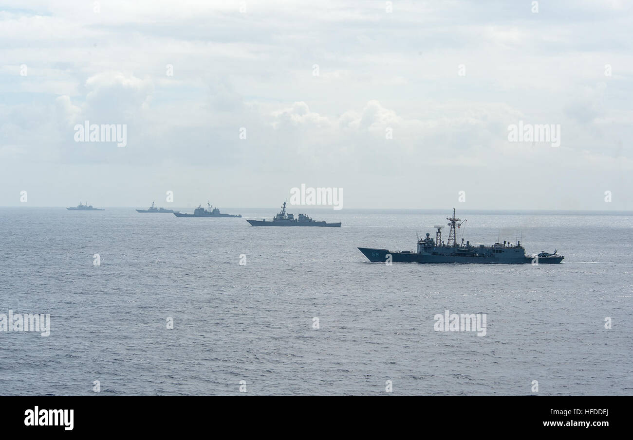 U.S. Navy ships with Destroyer Squadron (DESRON) 26 maneuver into ...