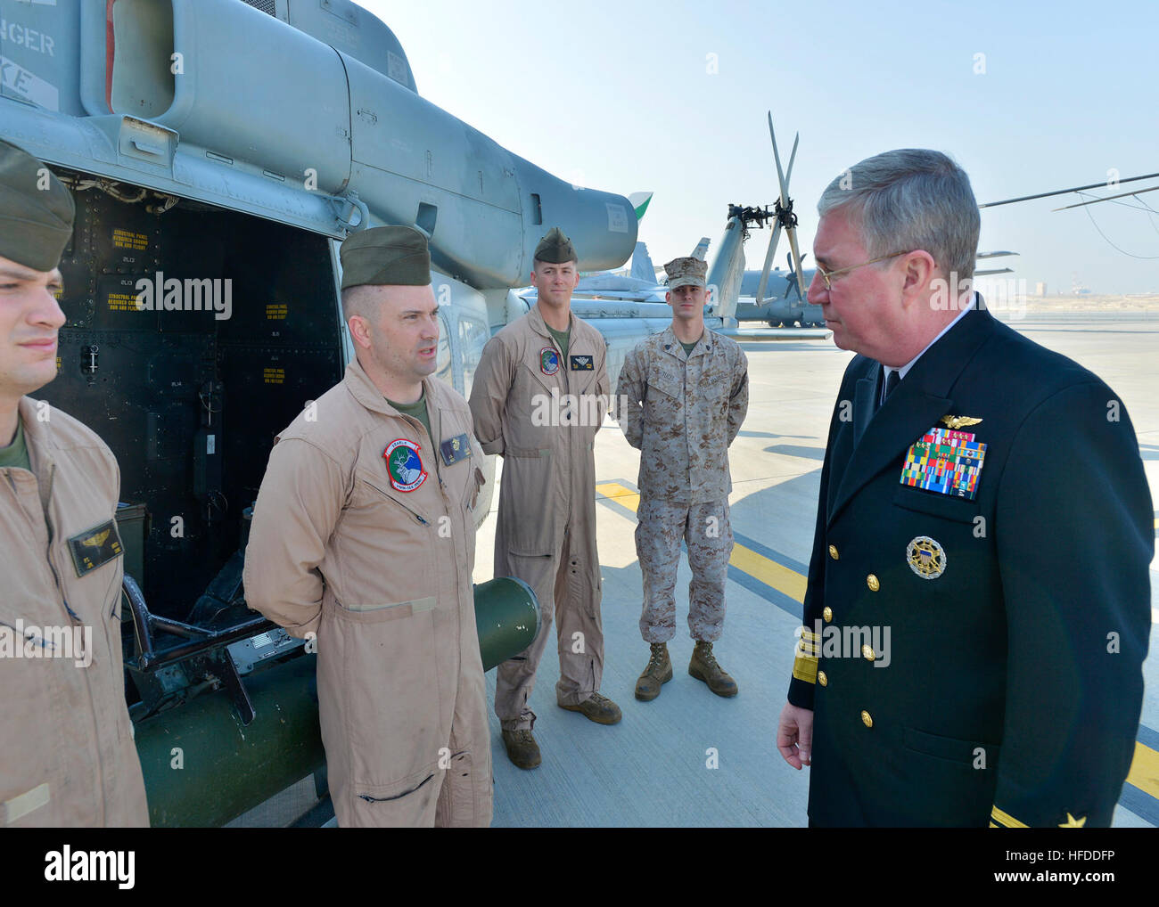 U.S. Navy Vice Adm. John W. Miller, right, the commander of U.S. Naval ...