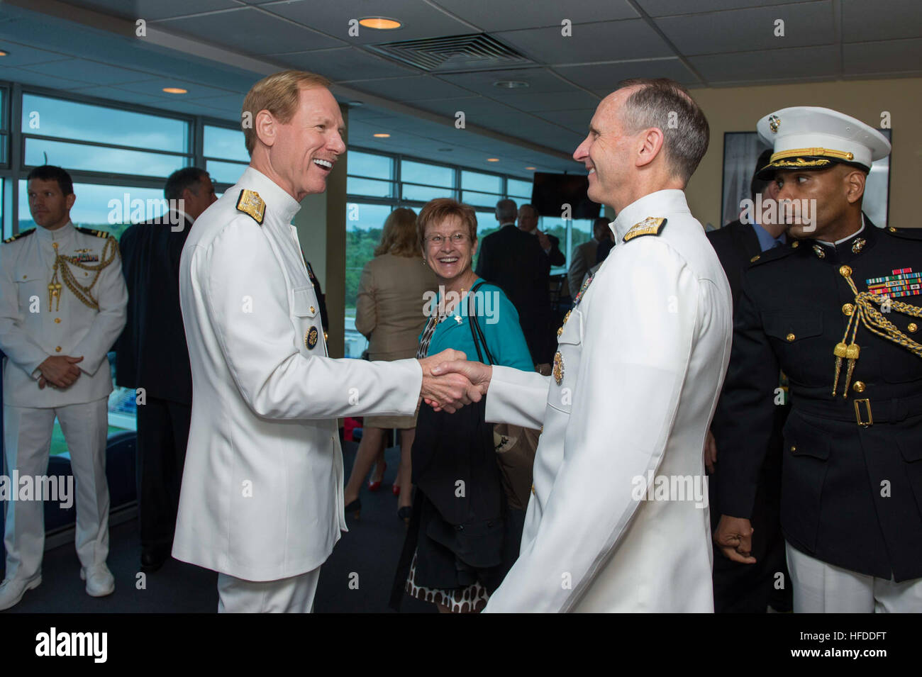 U.S. Navy Vice Adm. Mike Miller, foreground left, the superintendent of ...