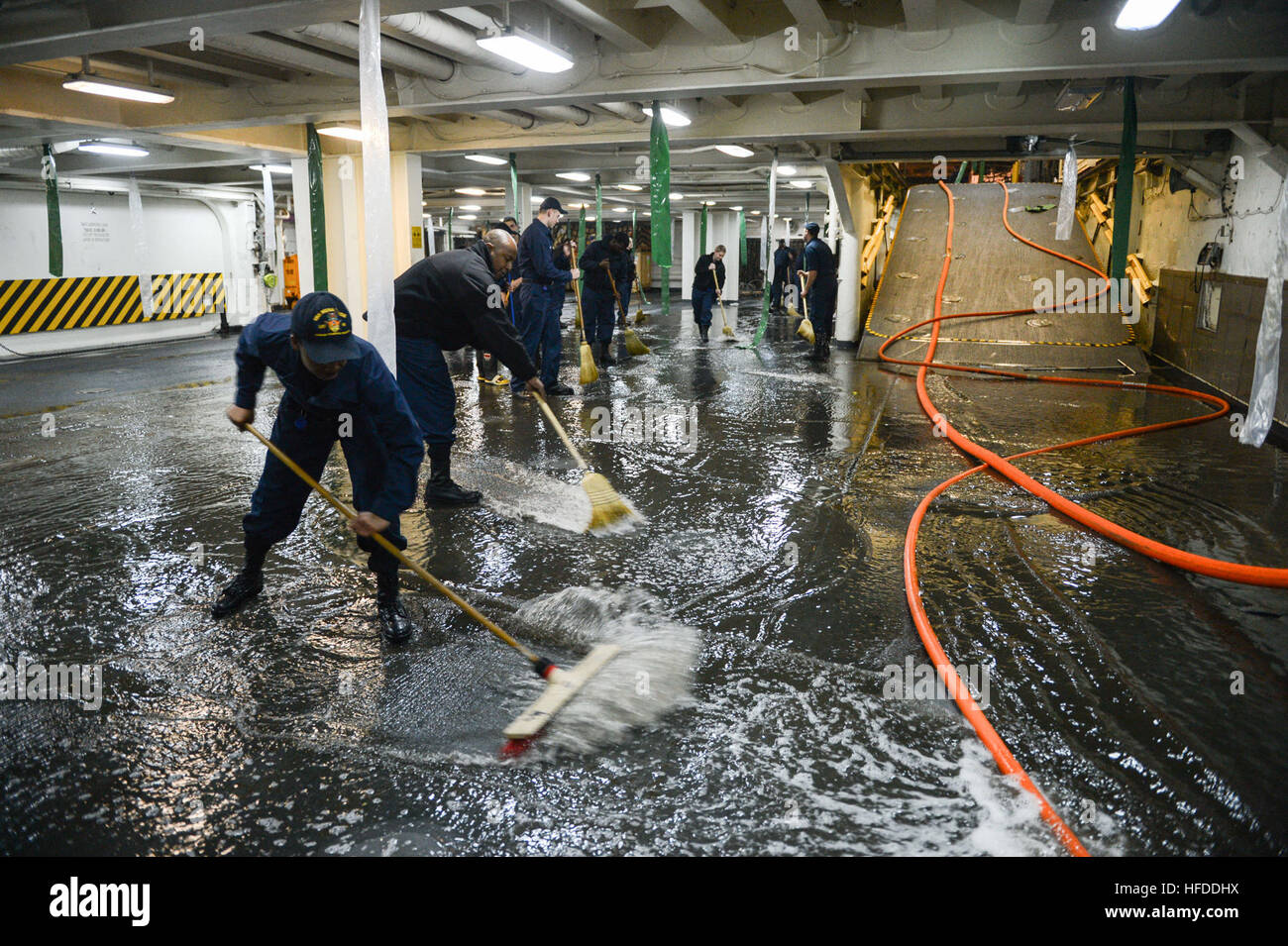U.S. Sailors aboard the amphibious transport dock ship USS Mesa Verde ...