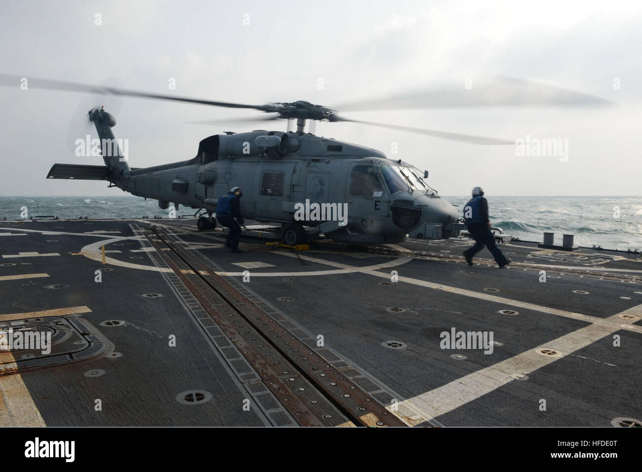 Sailors assigned to Arleigh Burke-class guided-missile destroyer USS ...