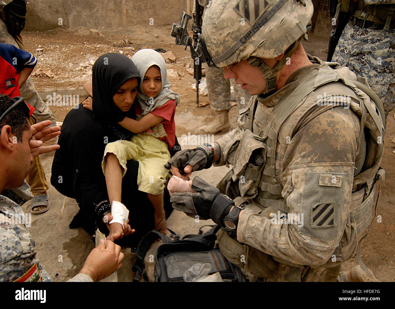 U.S. Army personnel of the 64th Armored Cavalry Regiment provide ...