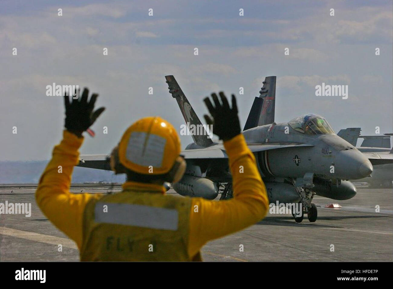 Aircraft Director giving the 'release brakes-taxi forward' signal Stock ...